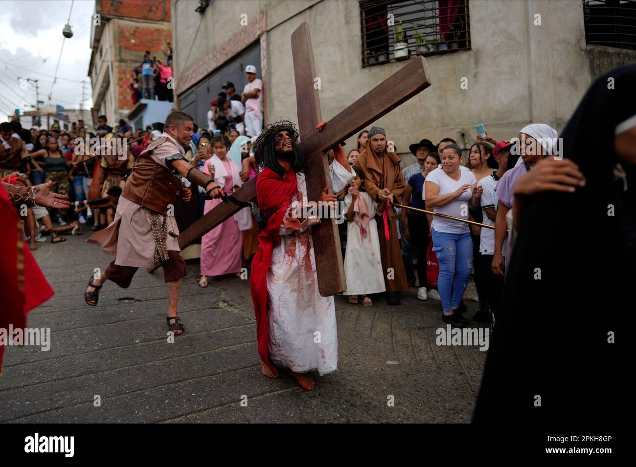 A penitent depicting the role of Jesus Christ is whipped by a fellow ...