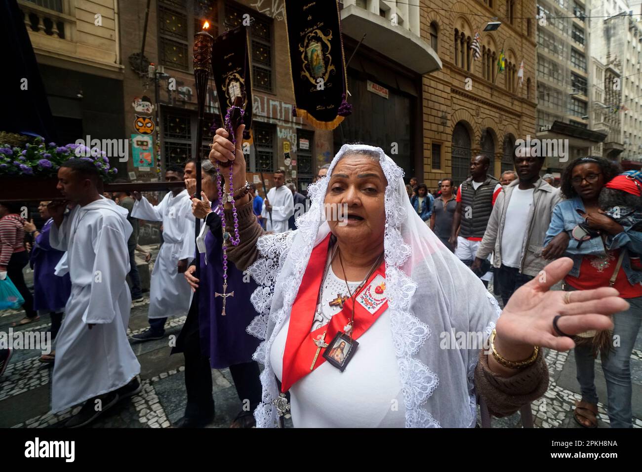 Catholic community people participate in a religious procession on the ...