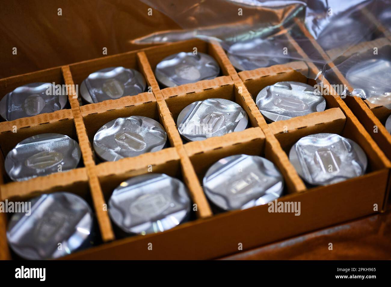 Finished batch of aluminum pistons for car engine in box Stock Photo ...
