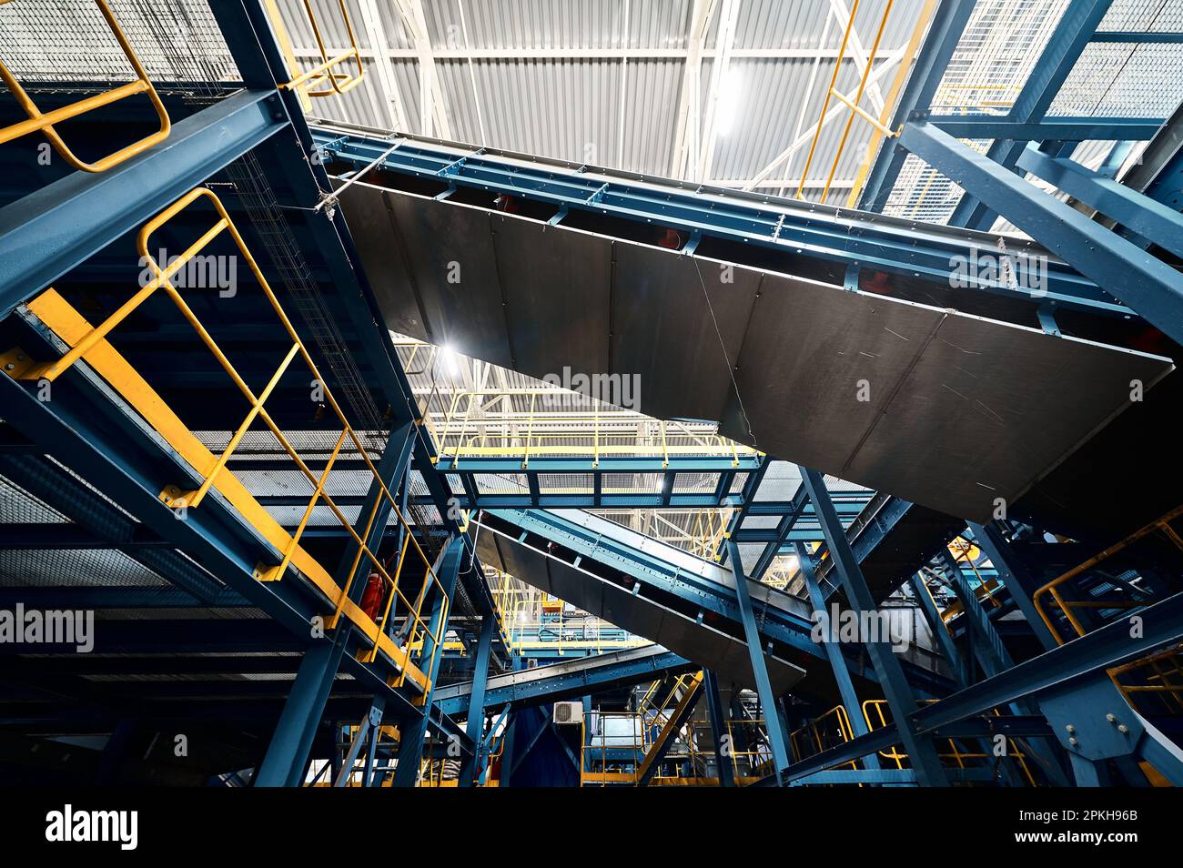 System of conveyors carrying trash at waste processing plant Stock ...