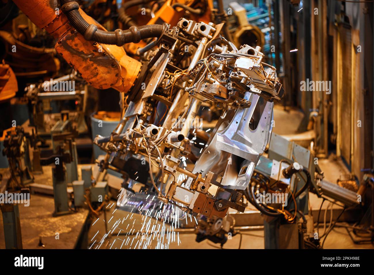 Modern robot welder processes metal part in factory workshop Stock ...