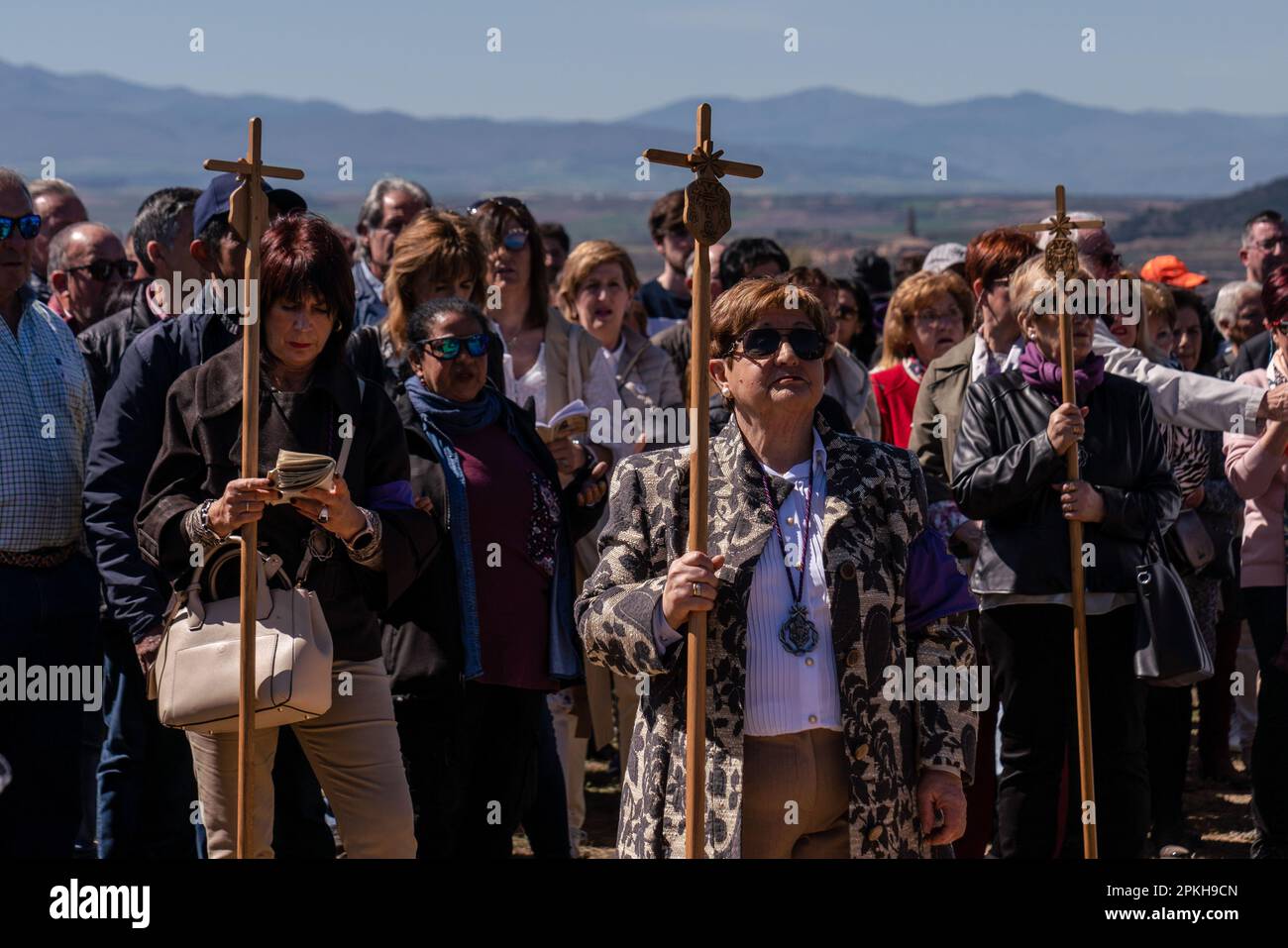 Penitents praying at a stop of the procession of the Via Crucis. In San ...