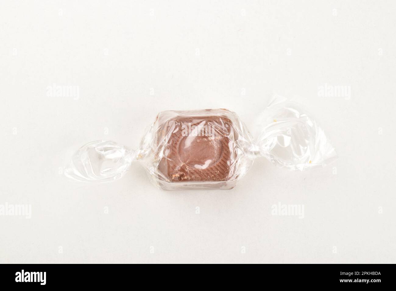 Top view of chocolate candy on white background Stock Photo - Alamy