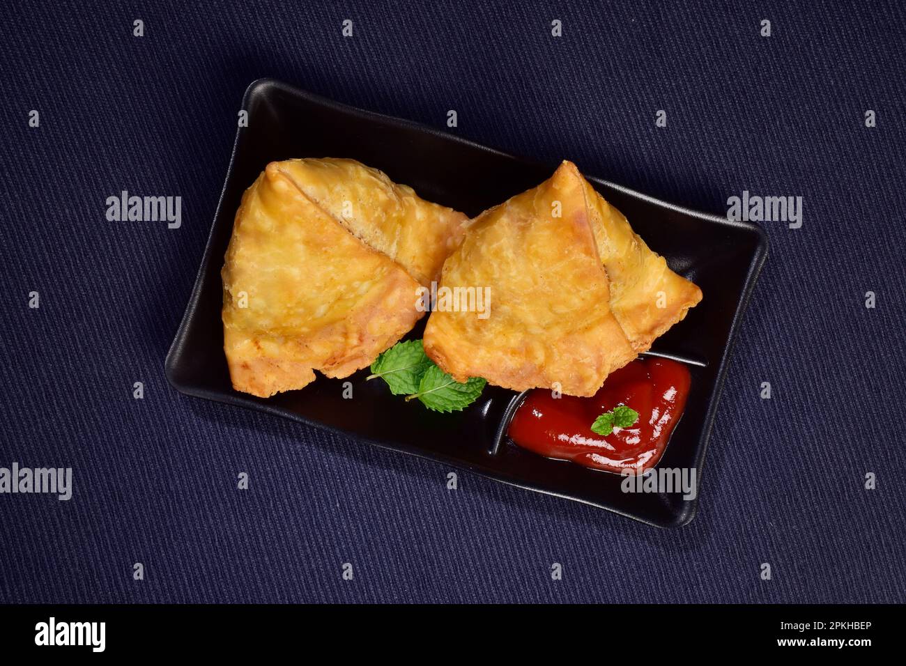 Top view of samosa served with ketchup Stock Photo - Alamy