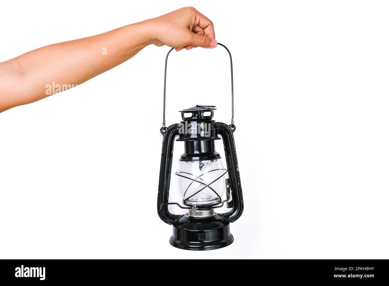 Hand holding black lantern isolated on white background. Lamp in hand ...