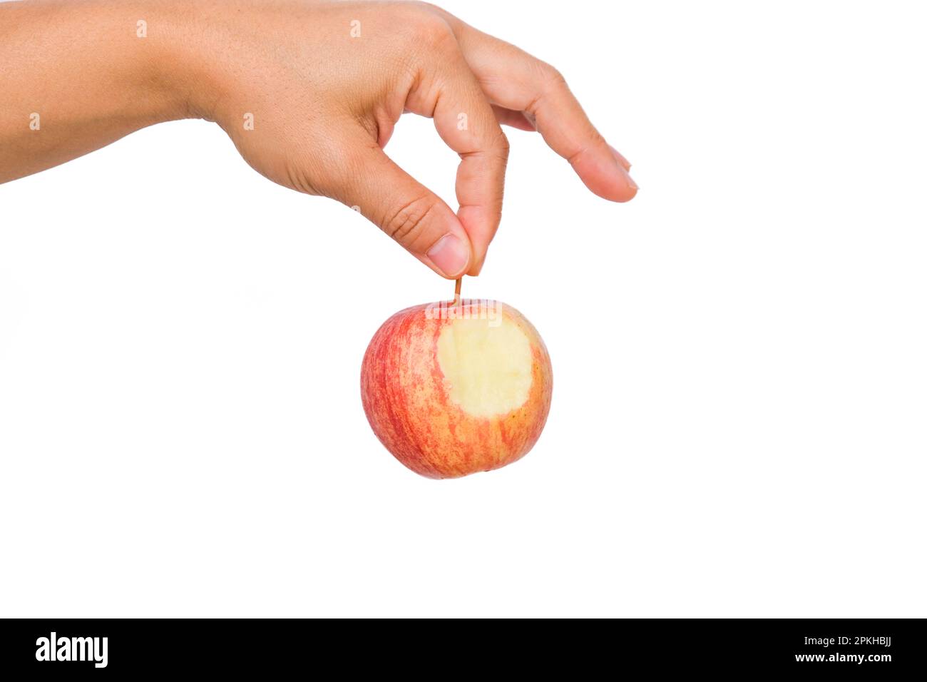 Hand holding bite red apple isolated on white background. Ripe red ...
