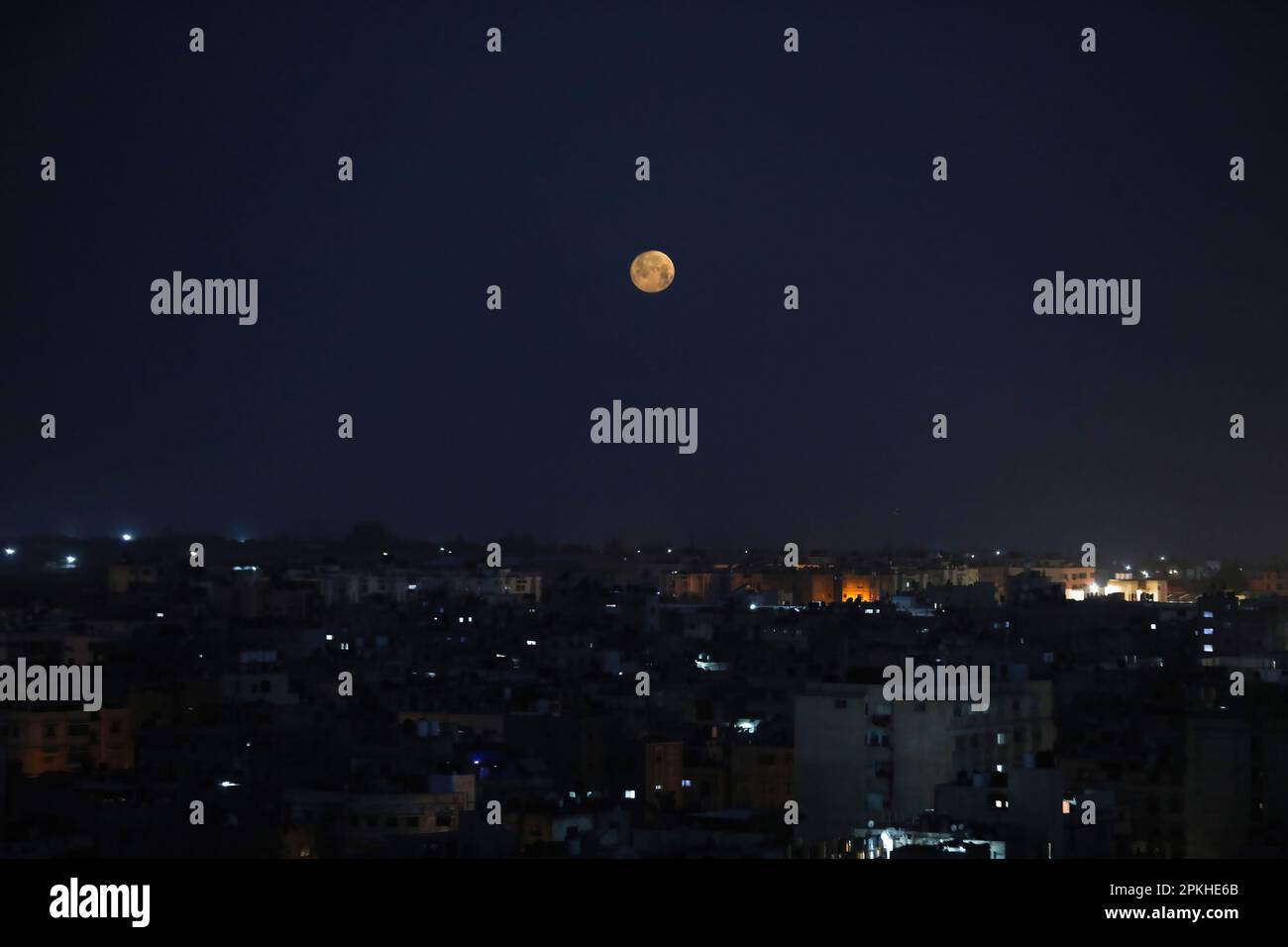Gaza, Palestine. 07th Apr, 2023. The full moon rises in the sky in Khan ...