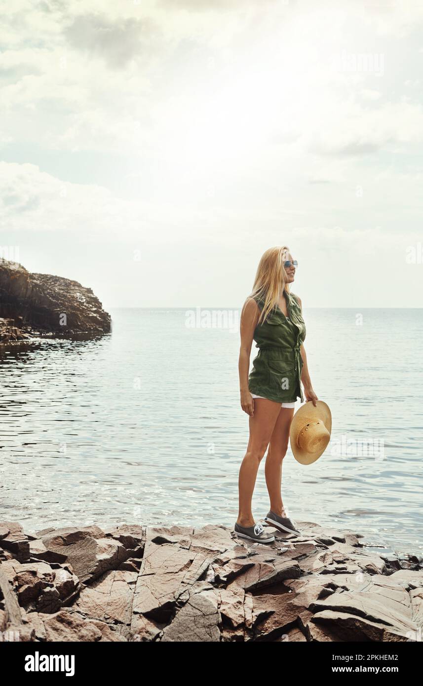 The beauty of nature is simply breathtaking. an attractive young woman ...