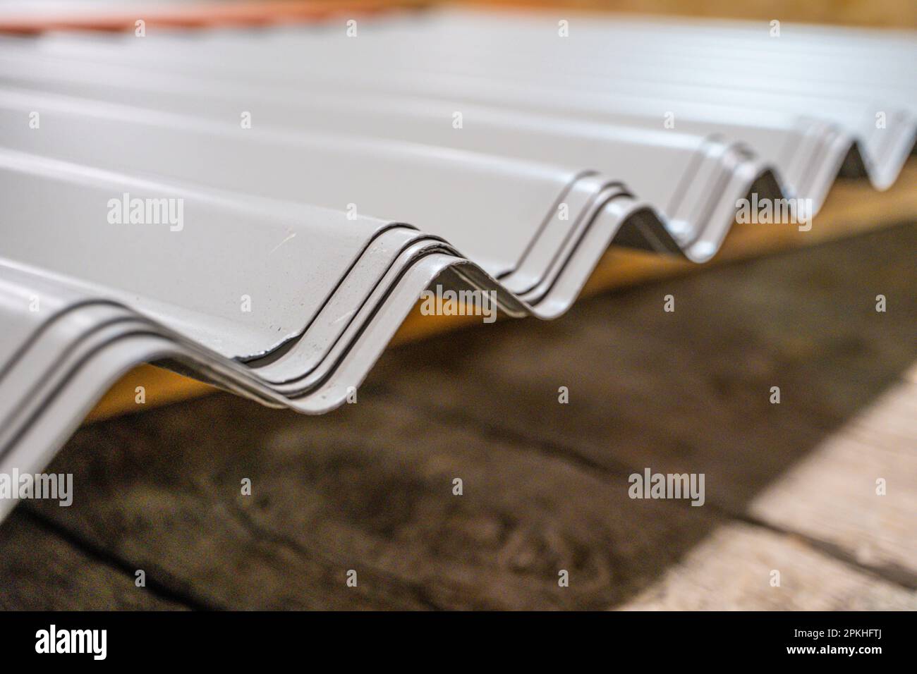 Metal Corrugated roofing profiles in metal roofing factory Stock Photo ...