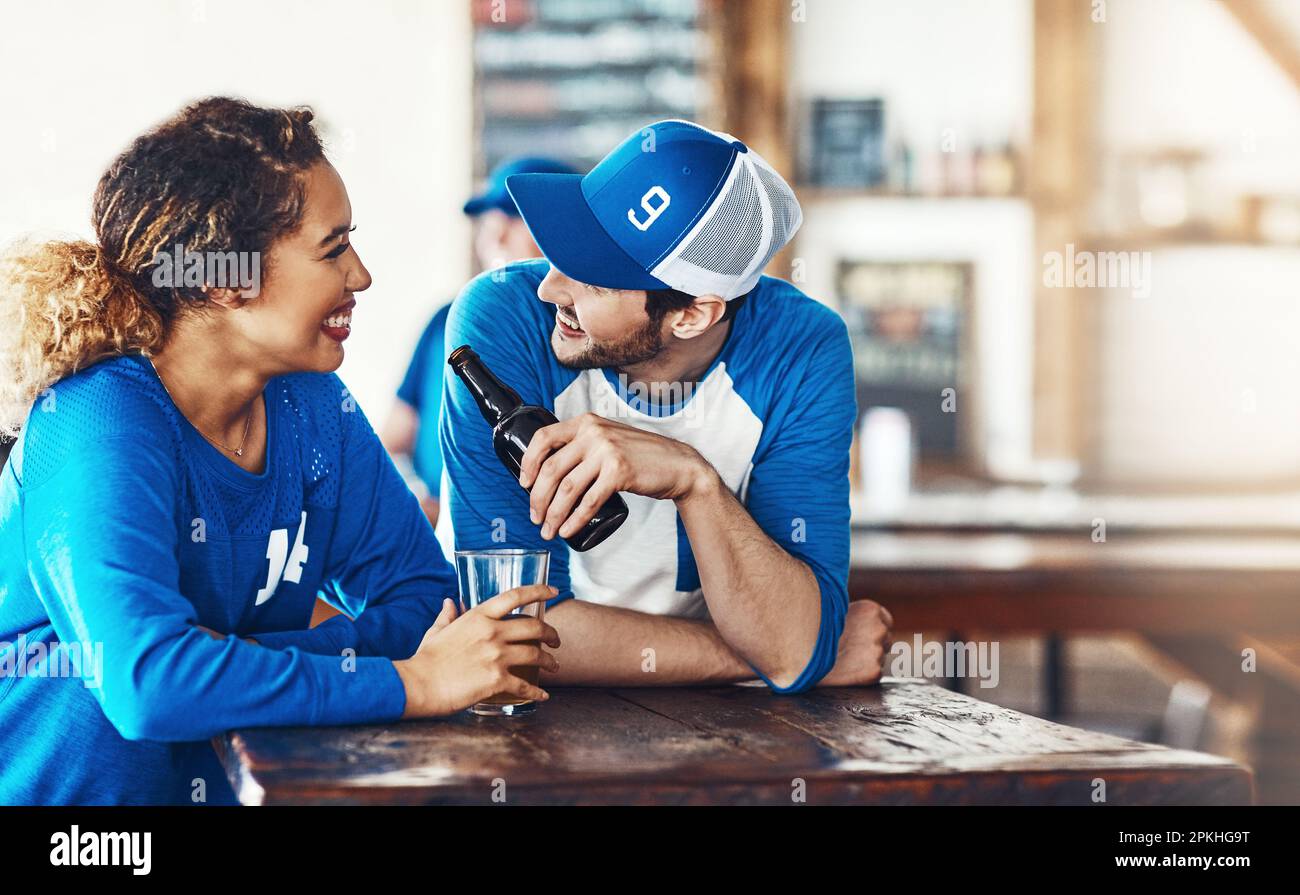Hes scoring big points with his charm. a young man and woman having ...