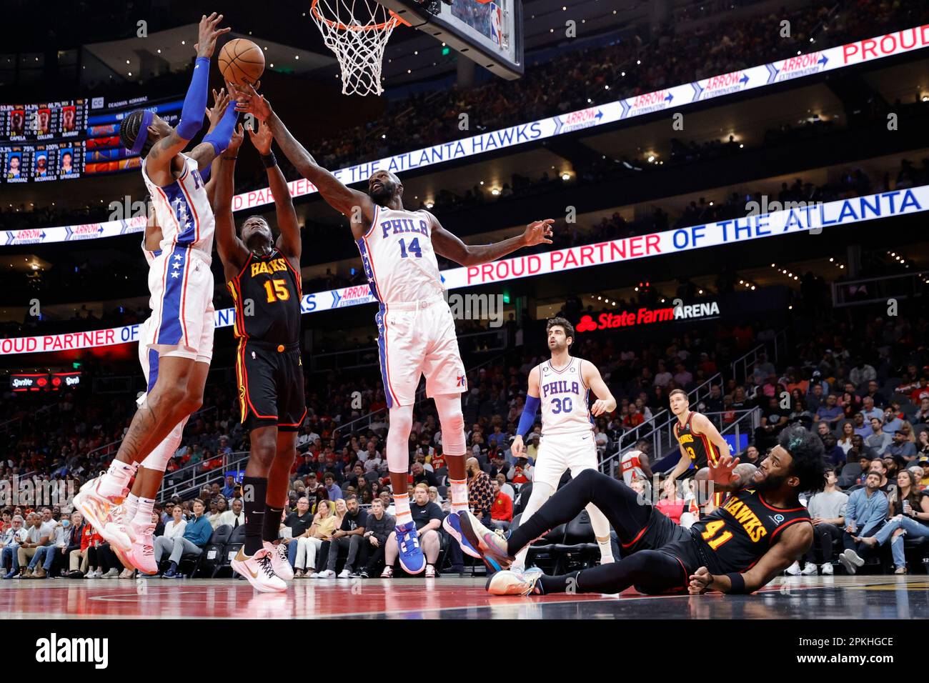 Atlanta Hawks center Clint Capela, second from left, and Philadelphia ...