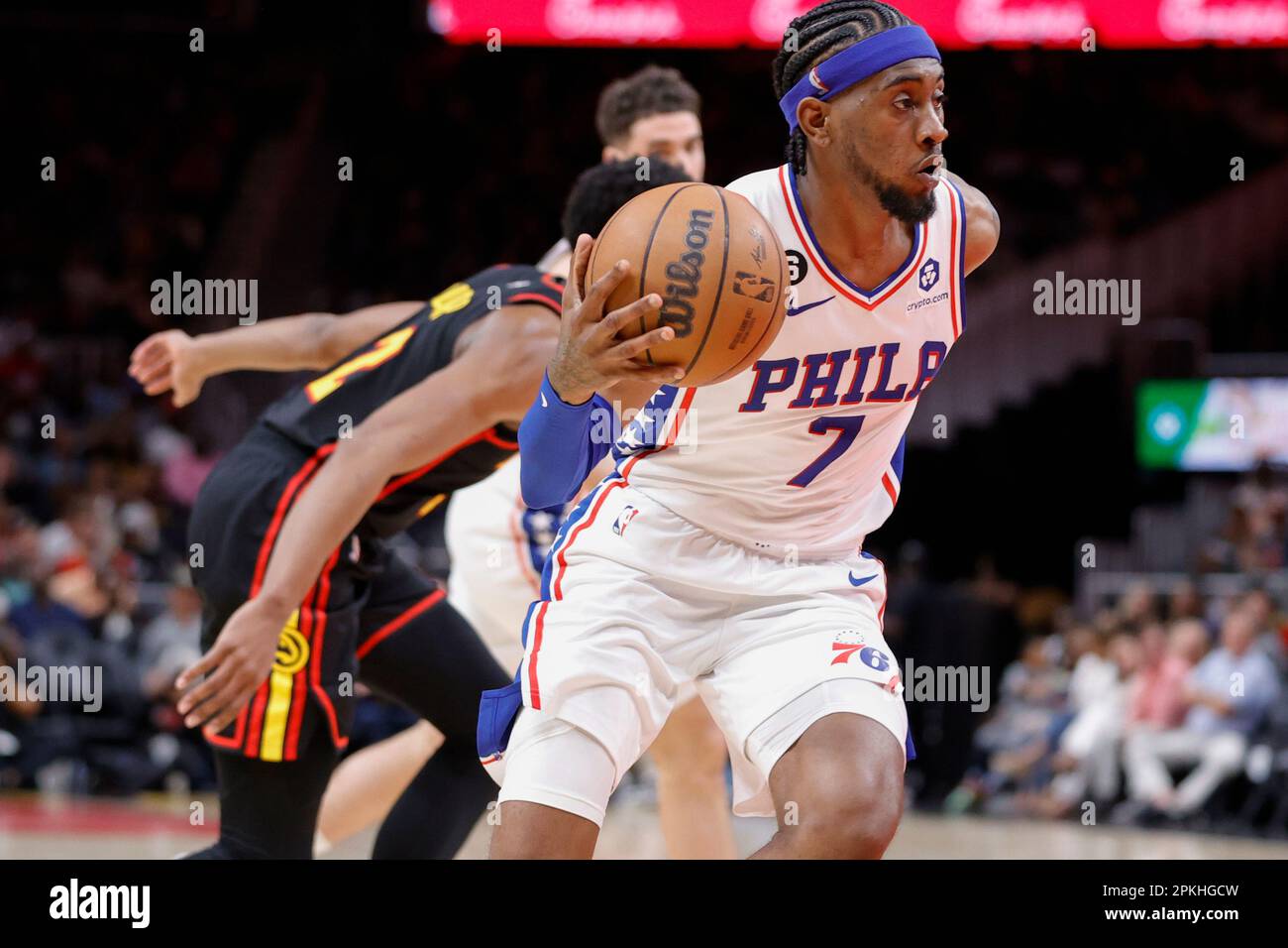 Philadelphia 76ers forward Jalen McDaniels, right, drives down court ...