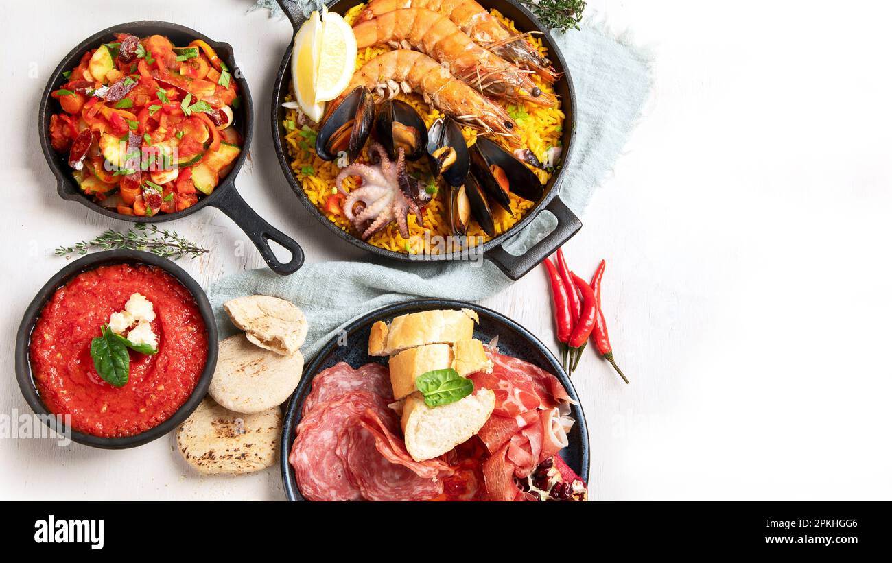 Typical spanish tapas concept. Concept include jamon, chorizo sausage ...