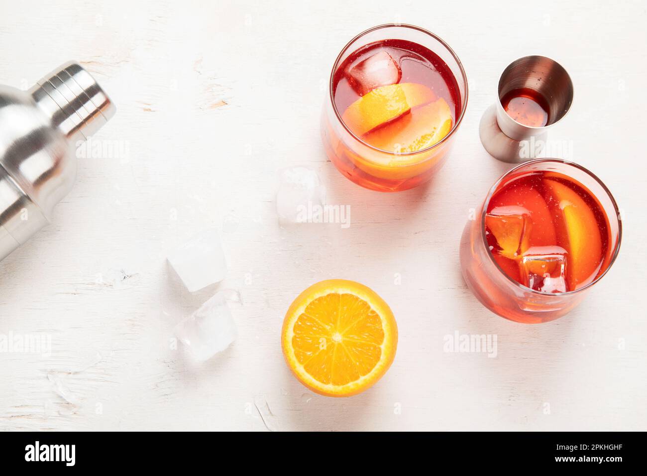 Different delicious cocktails on table. Alcoholic coctail with fruit ...