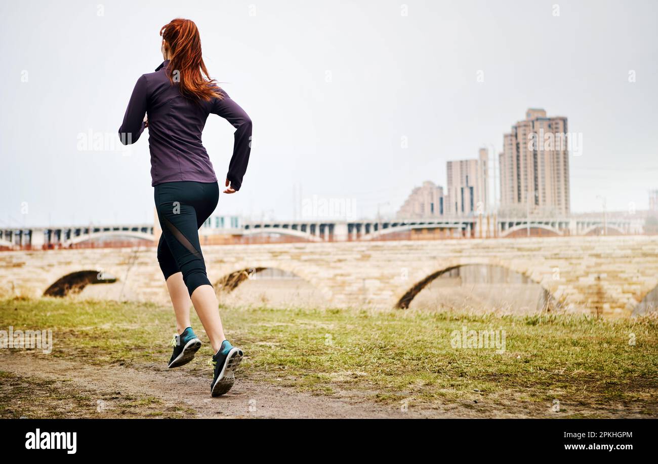 To stay well you need to stay active. Rear view shot of a sporty young ...