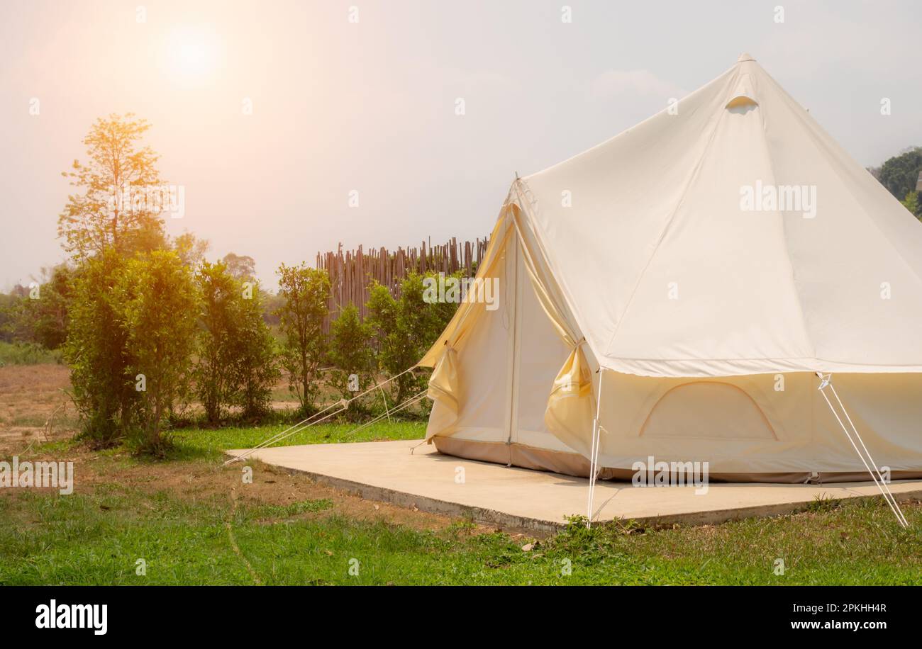 Camping picnic tent campground in outdoor hiking forest. Camper while ...