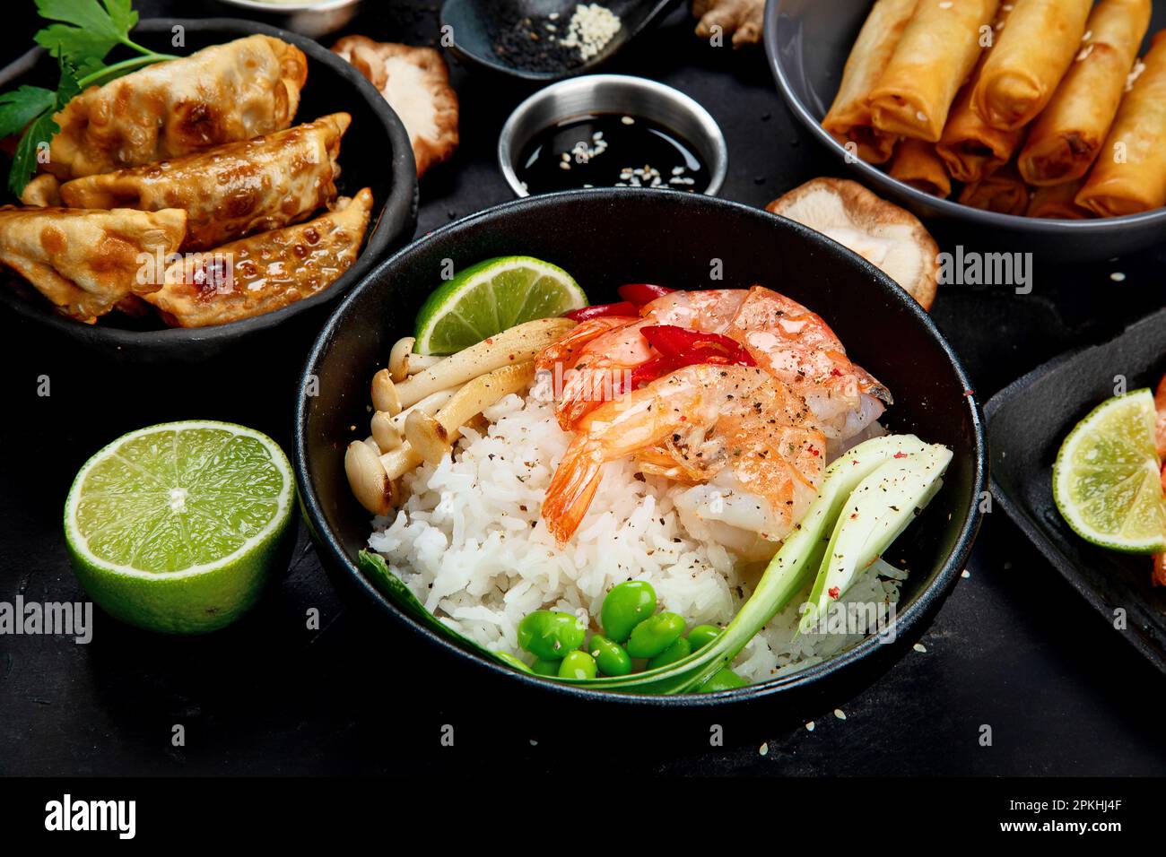 Various asian meals dishes on black background. Asian food concept ...