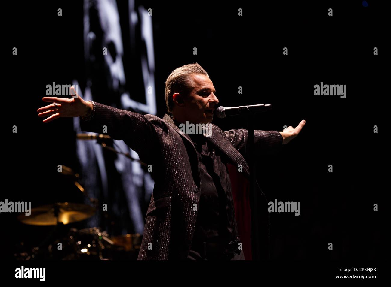 Depeche Mode lead singer Dave Gahan performing on stage during the "Memento Mori" Tour Stock ...