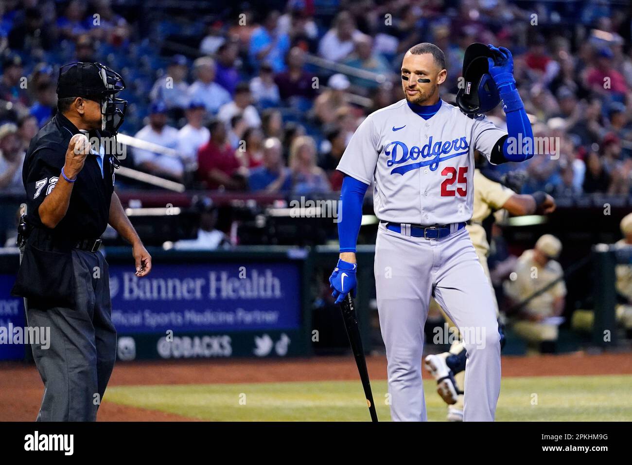 Los Angeles Dodgers' Trayce Thompson pauses at home plate after being ...