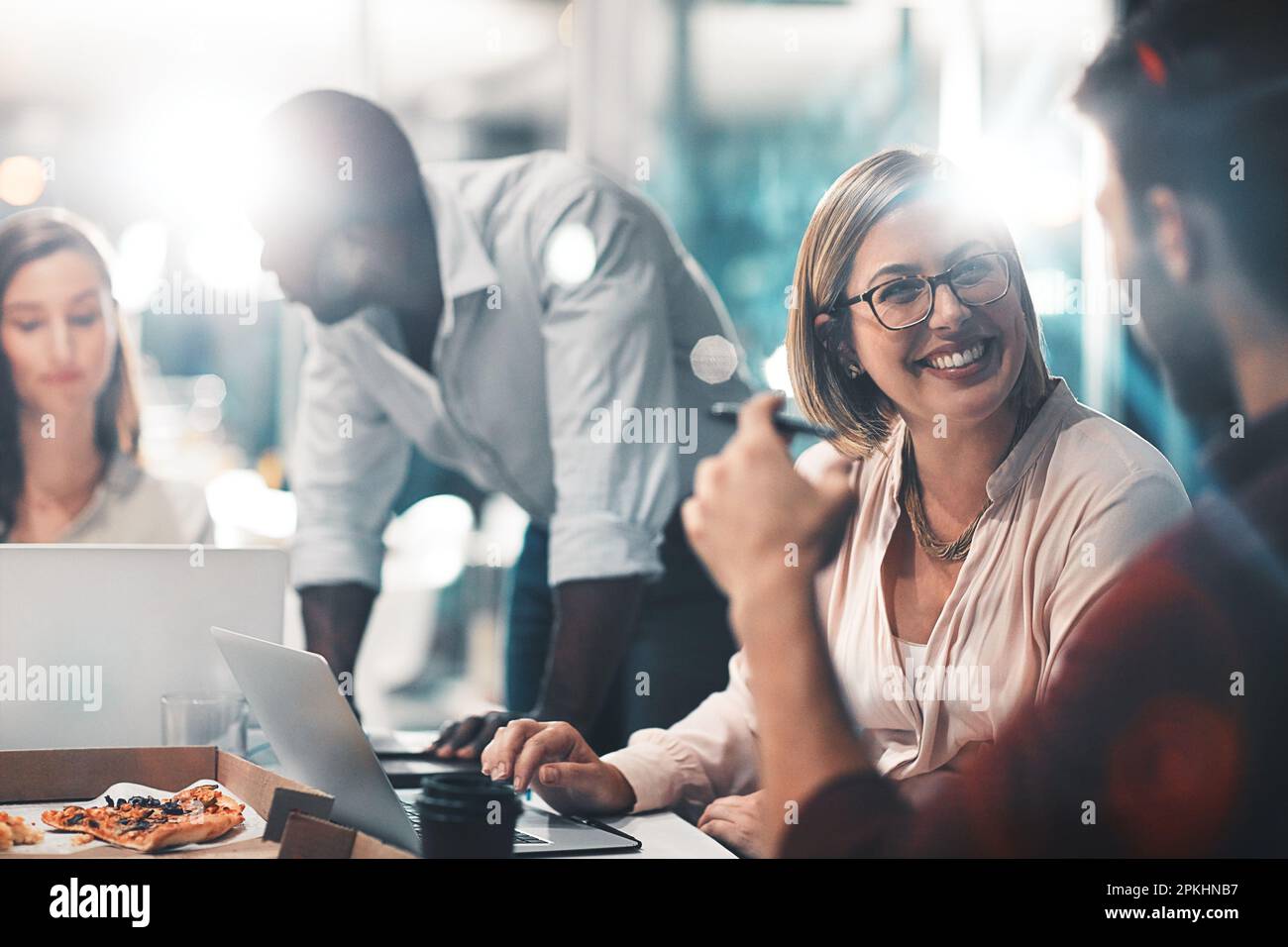 Success is a team task. colleagues collaborating on a project in a ...
