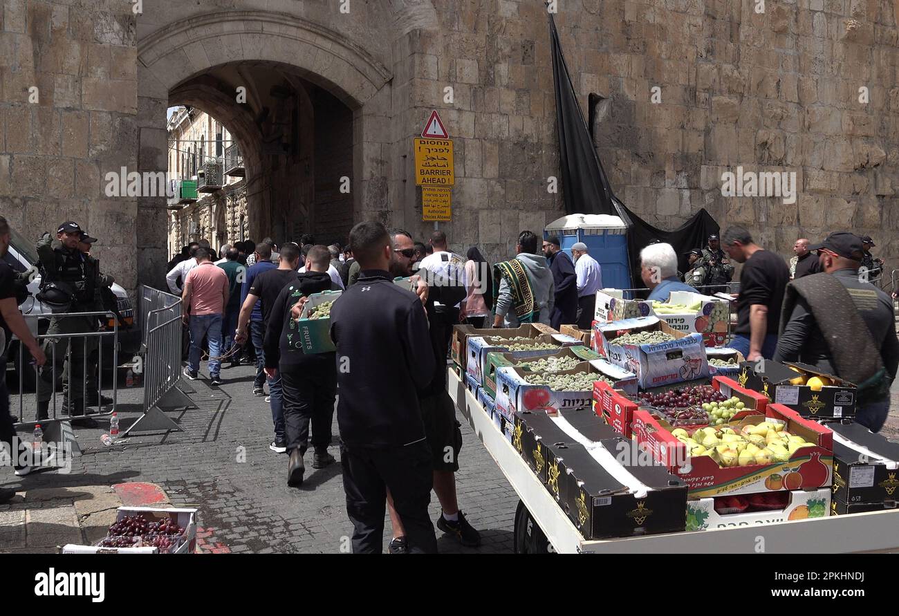 Members of the Israeli security forces stand guard as Muslim worshipers ...