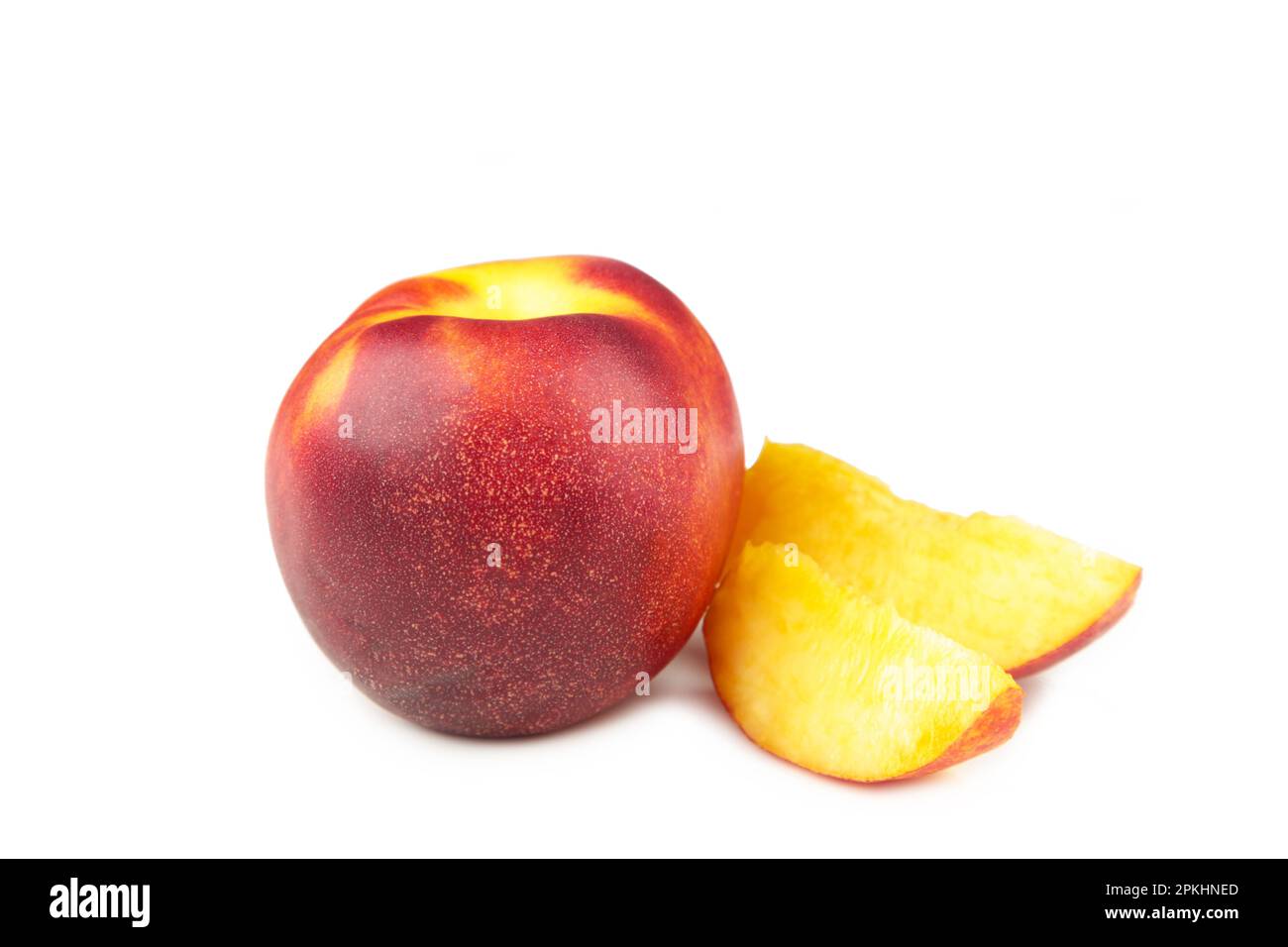 Nectarine fruit with slices isolated on white background. Top view ...