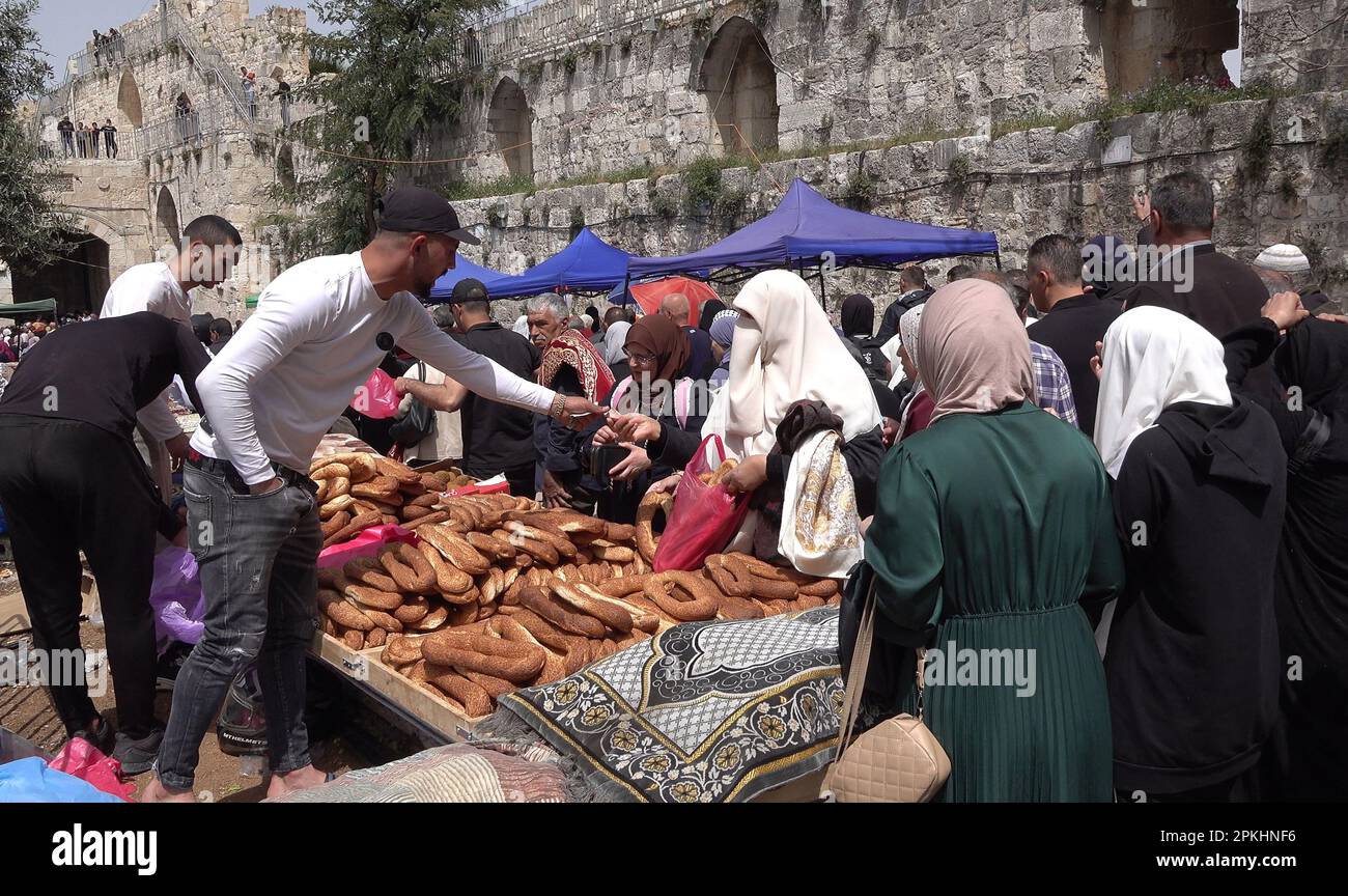 JERUSALEM, ISRAEL - APRIL 7: Muslim worshipers buy bagels as they leave ...