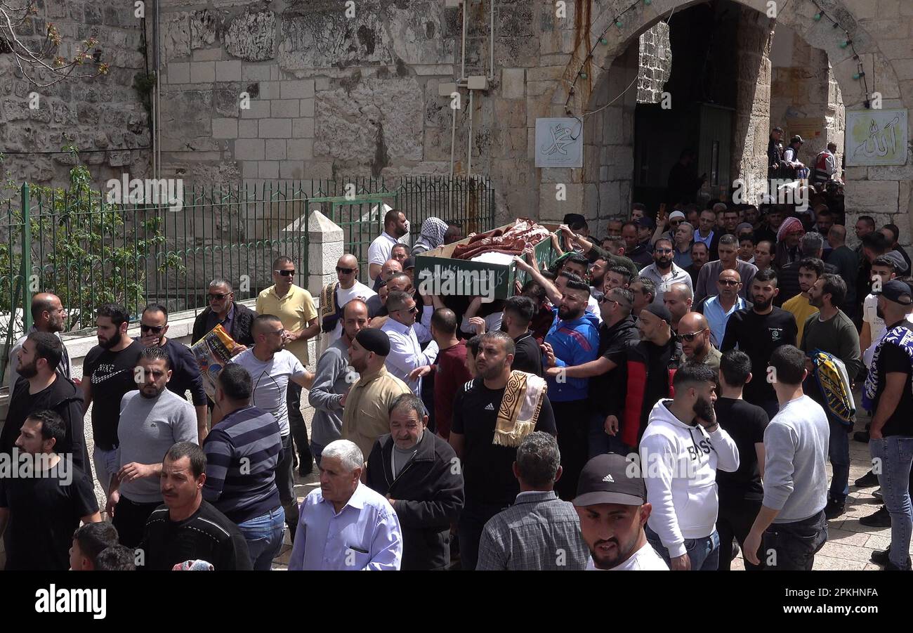 Muslim worshipers carry a coffin as they leave the temple mount after ...