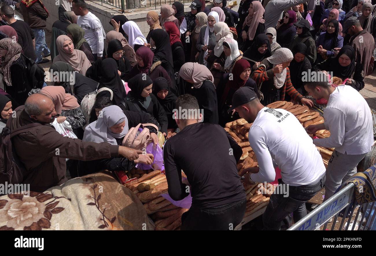 JERUSALEM, ISRAEL - APRIL 7: Muslim worshipers buy bagels as they leave ...