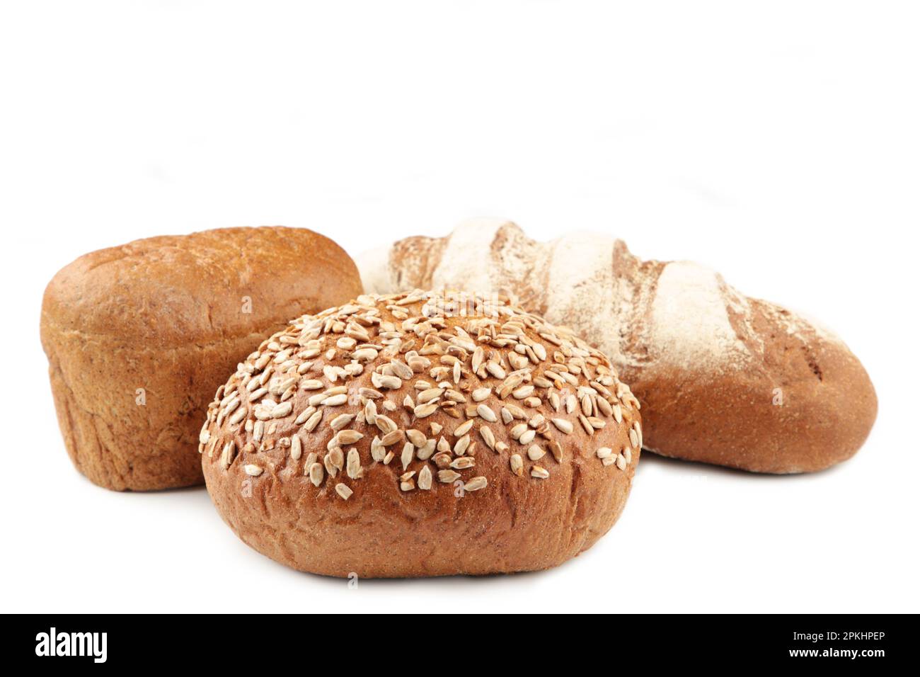 Assortment of different types of bread isolated on a white background ...