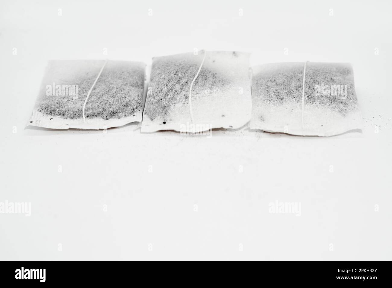 Three useful tea bags for brewing and drinking isolated on white Stock ...