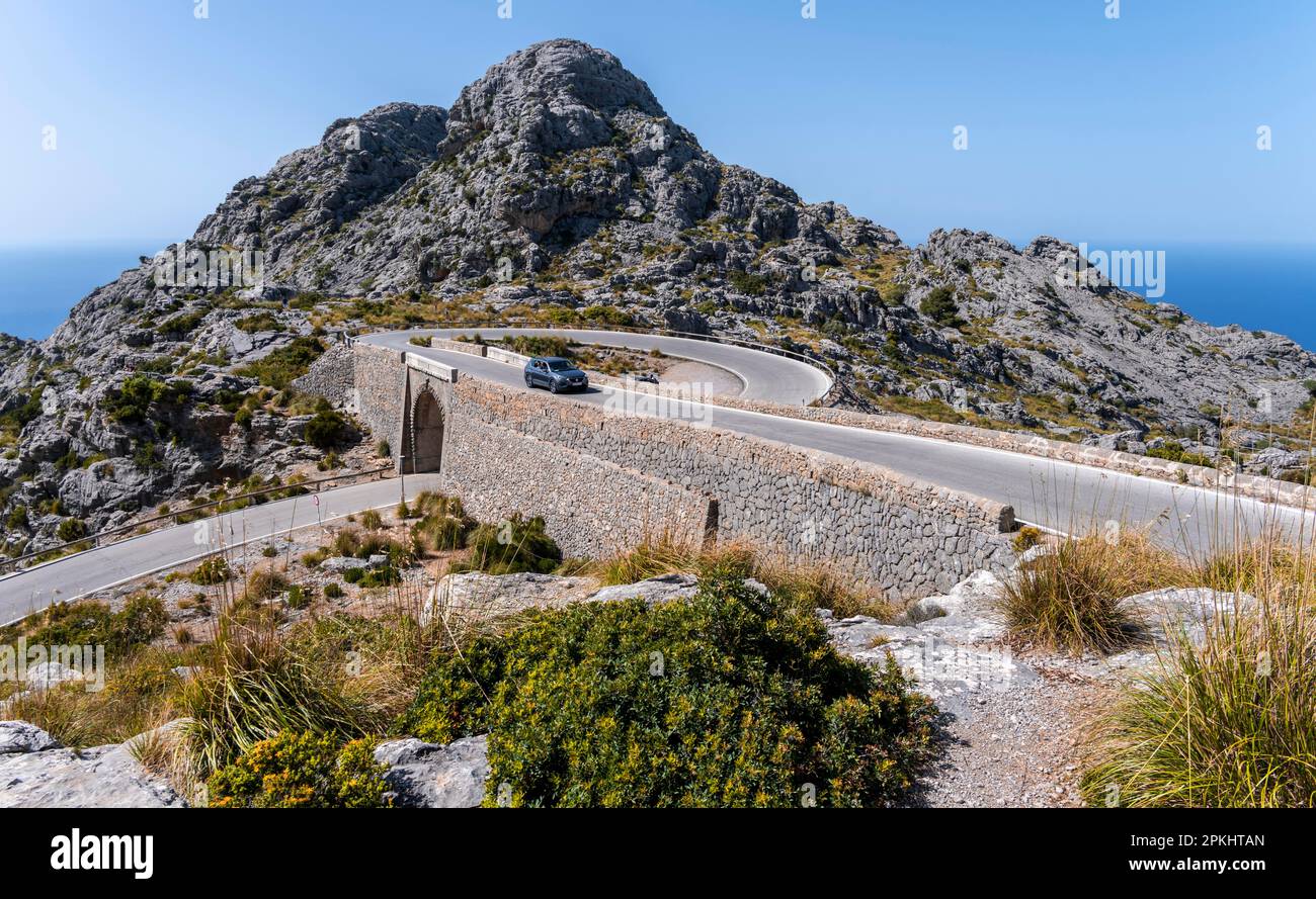 Car on mountain road with many curves to Sa Colobra, Nus de Sa Corbata ...