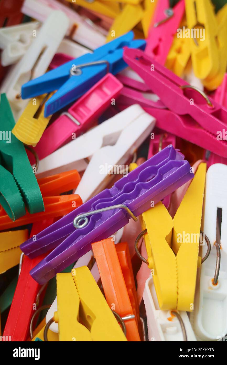Orange clothes pegs hi-res stock photography and images - Alamy