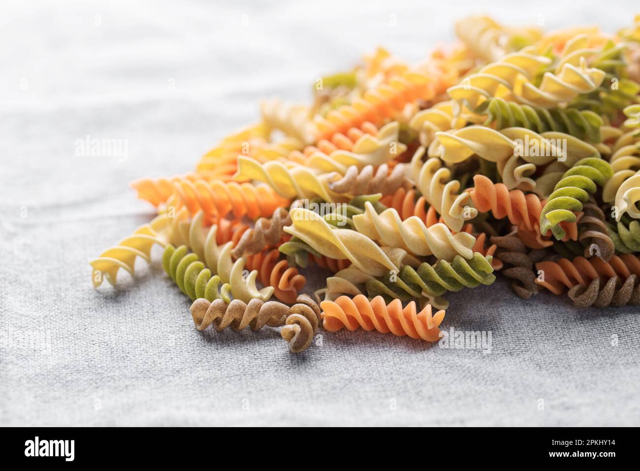 A variety of fusilli pasta made from different types of legumes, green ...