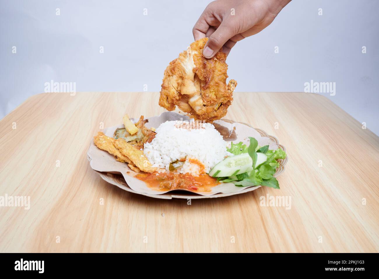 Child eating rice hands hi-res stock photography and images - Alamy
