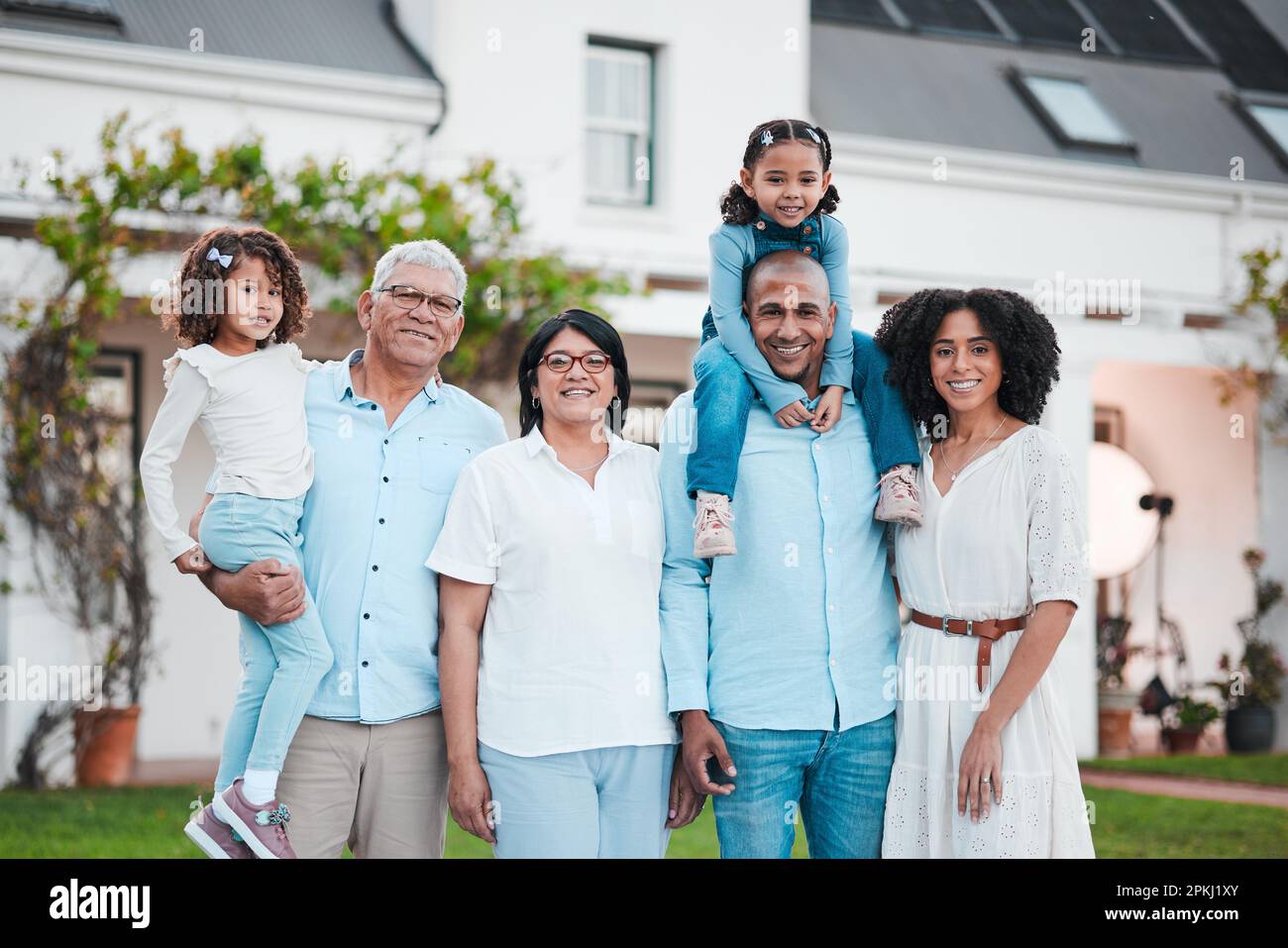 Happy, support and portrait of big family at home for bonding ...