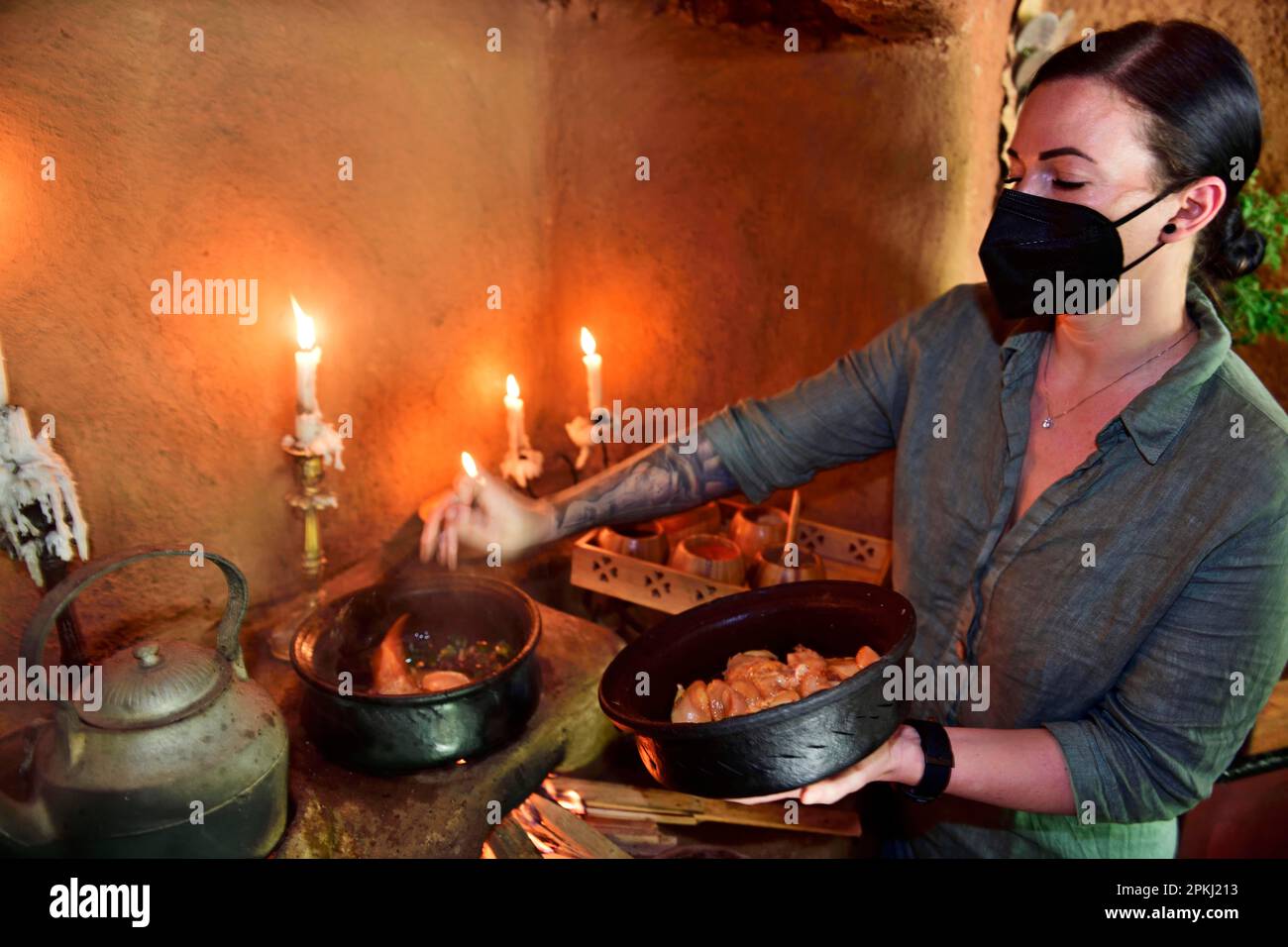 Tourist at a cooking class for typical Sri Lankan kitchen, Thotupola ...