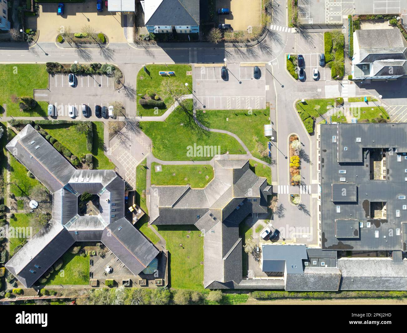 Drone top down view of a modern NHS hospital complex showing the ...