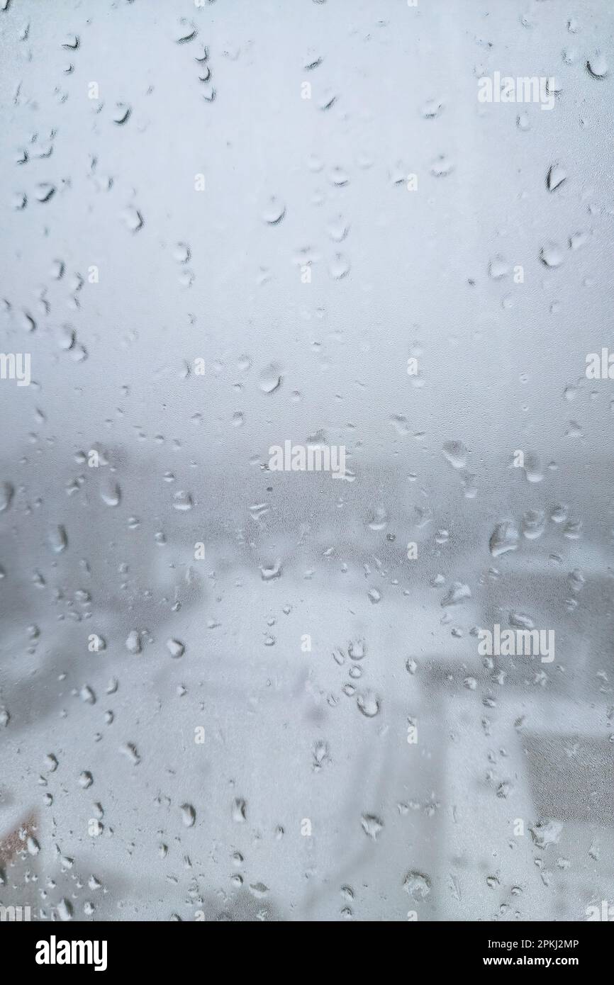Wet window with rain drops in a foggy day Stock Photo - Alamy