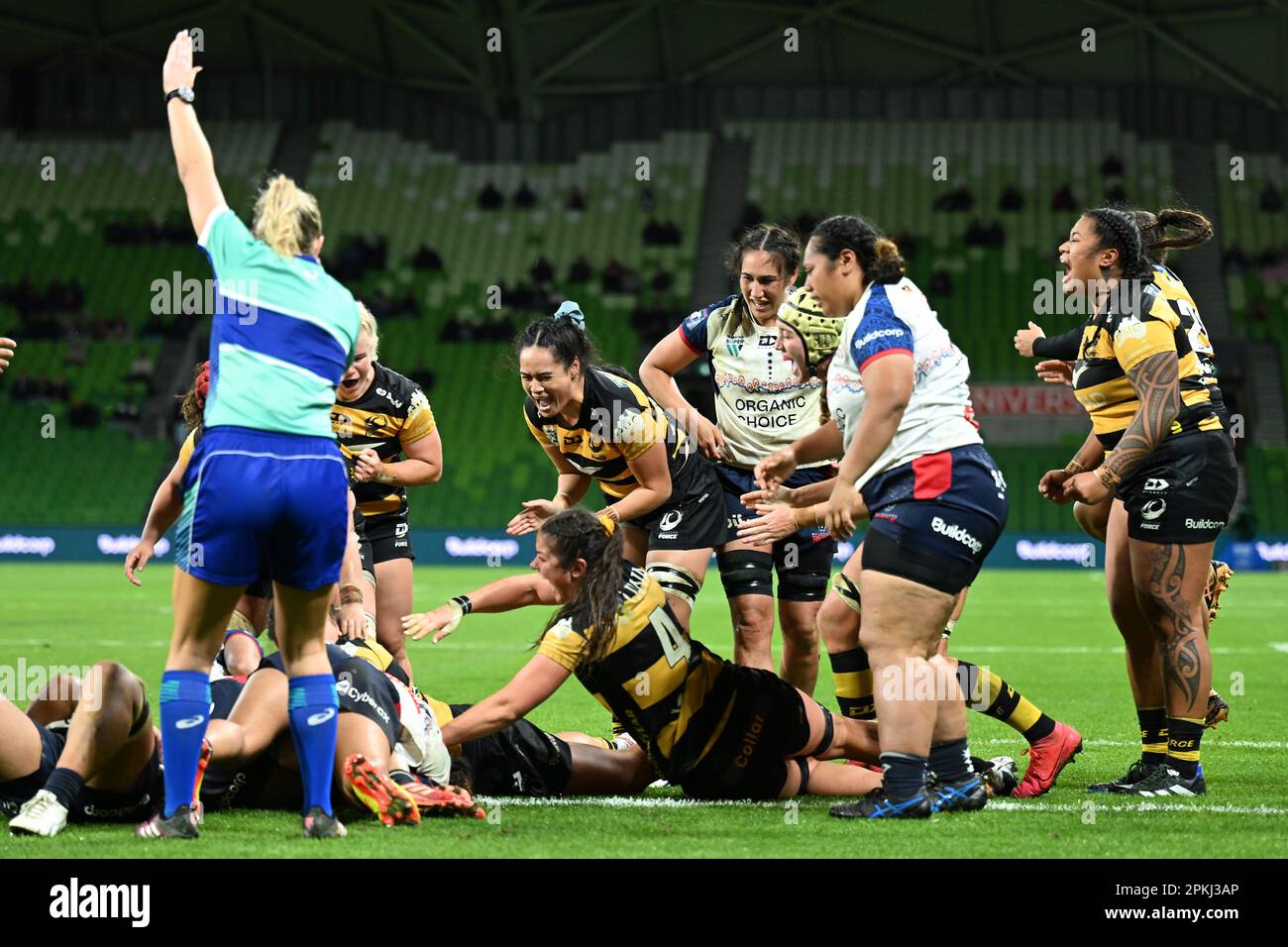 Western Force players celebrate after Nicole Ledington of Western Force ...