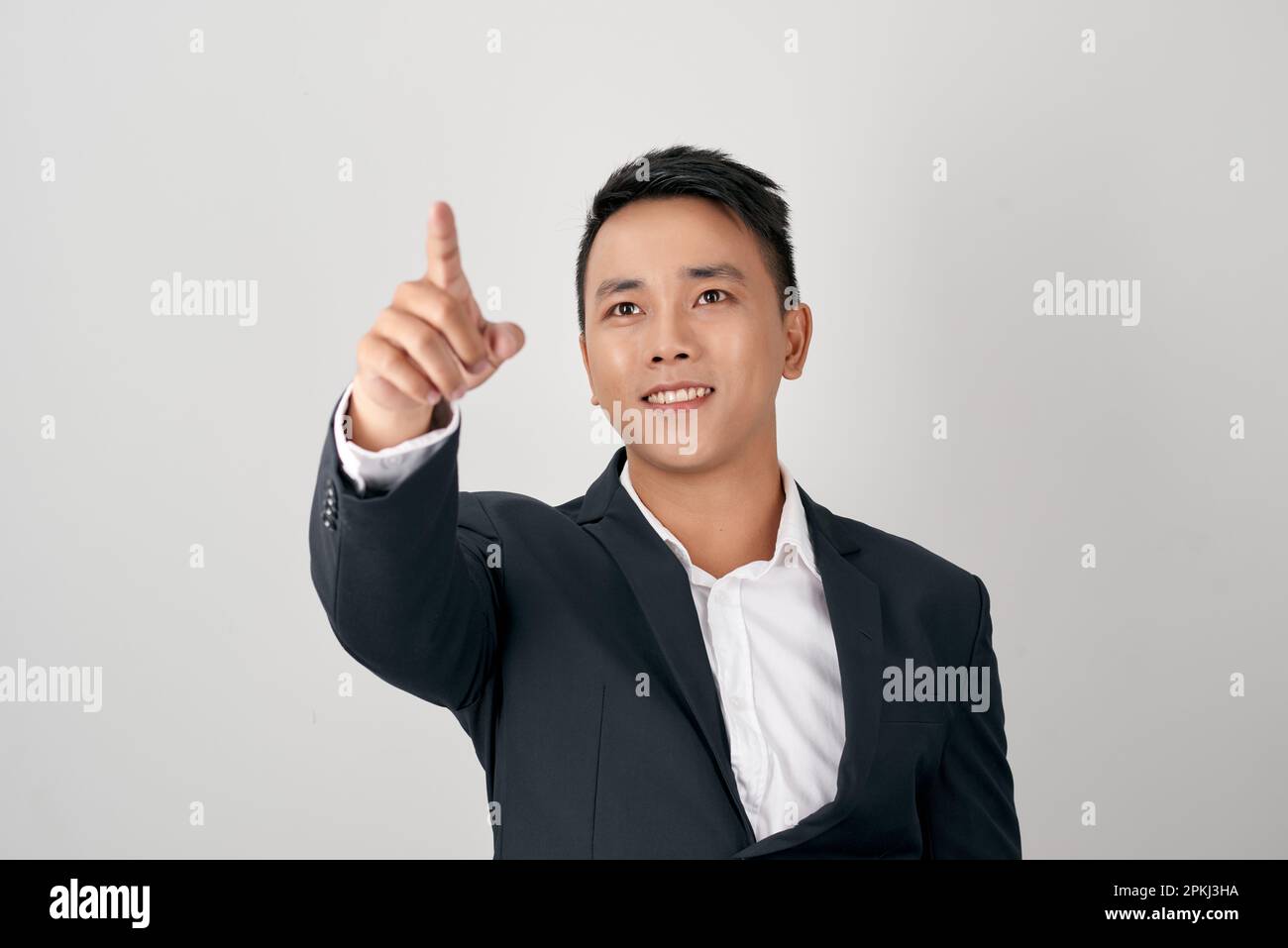 Man touching on a touchscreen with his finger Stock Photo - Alamy