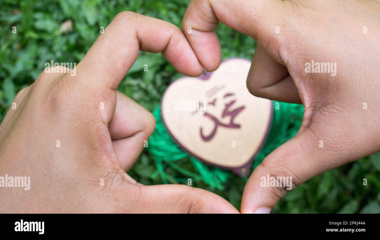 Heart hands sacred heart hi-res stock photography and images - Alamy