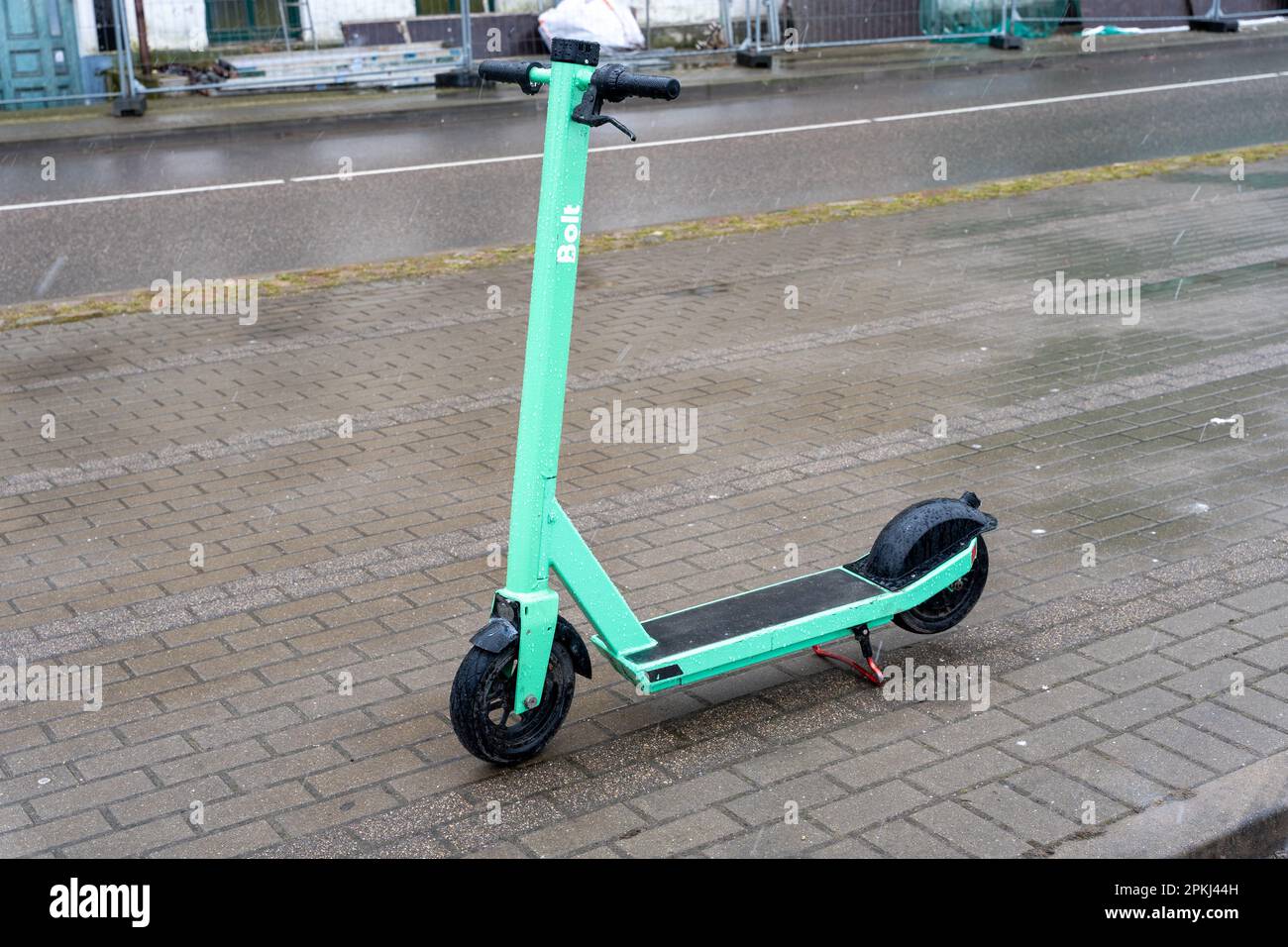 Liepāja, Latvia - 04.01.2023: Parked Bolt green electric scooter on ...
