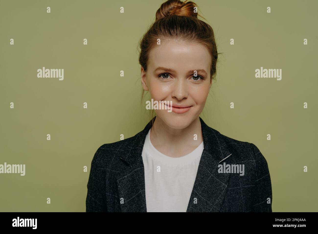 Close up of smiling young trendy female student dressed in casual ...