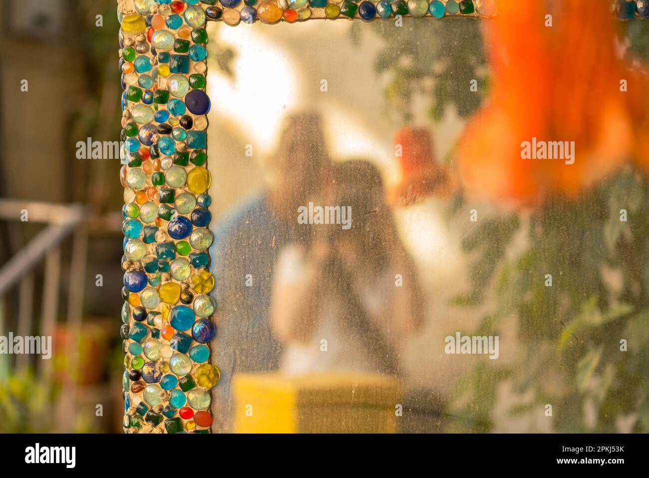 Happy Tourist Couple Captures Blurry Mirror Selfie with Colored Glass ...