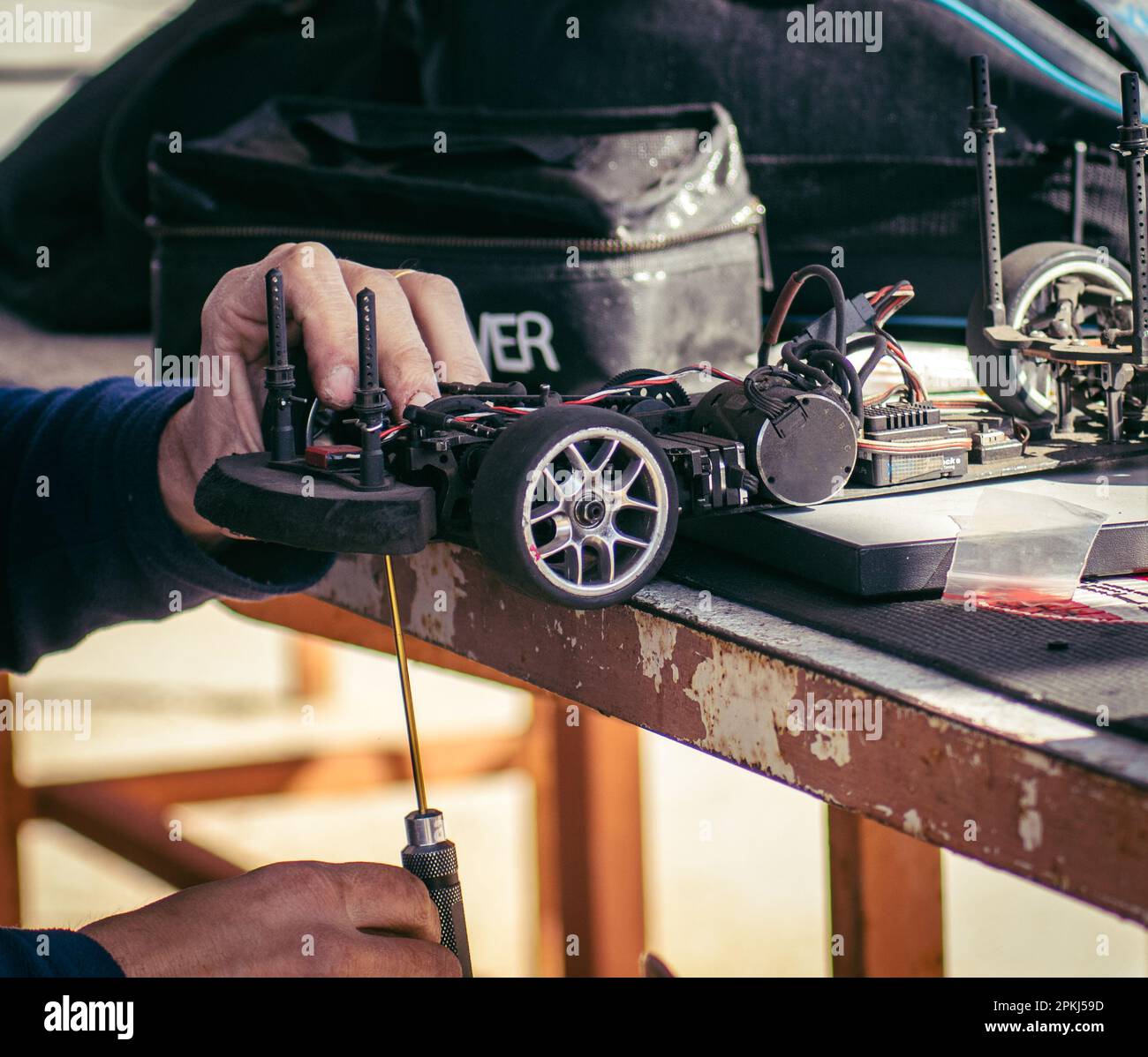 Miniature battery in action hi-res stock photography and images - Alamy