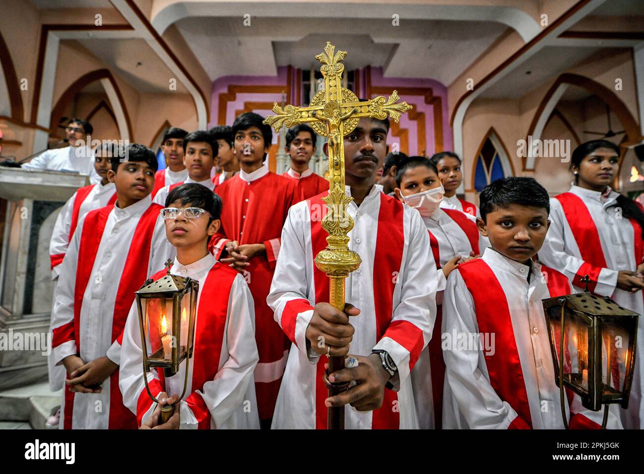 Kolkata, India. 07th Apr, 2023. Youth devotees carry a cross as they take part in the Good ...