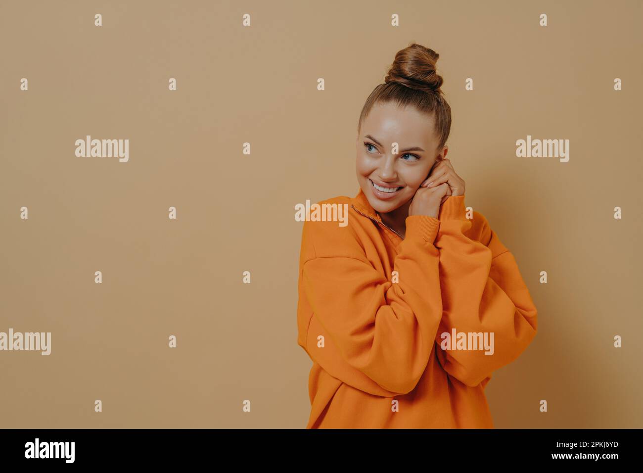 Woman blushing hands to face hi-res stock photography and images - Alamy