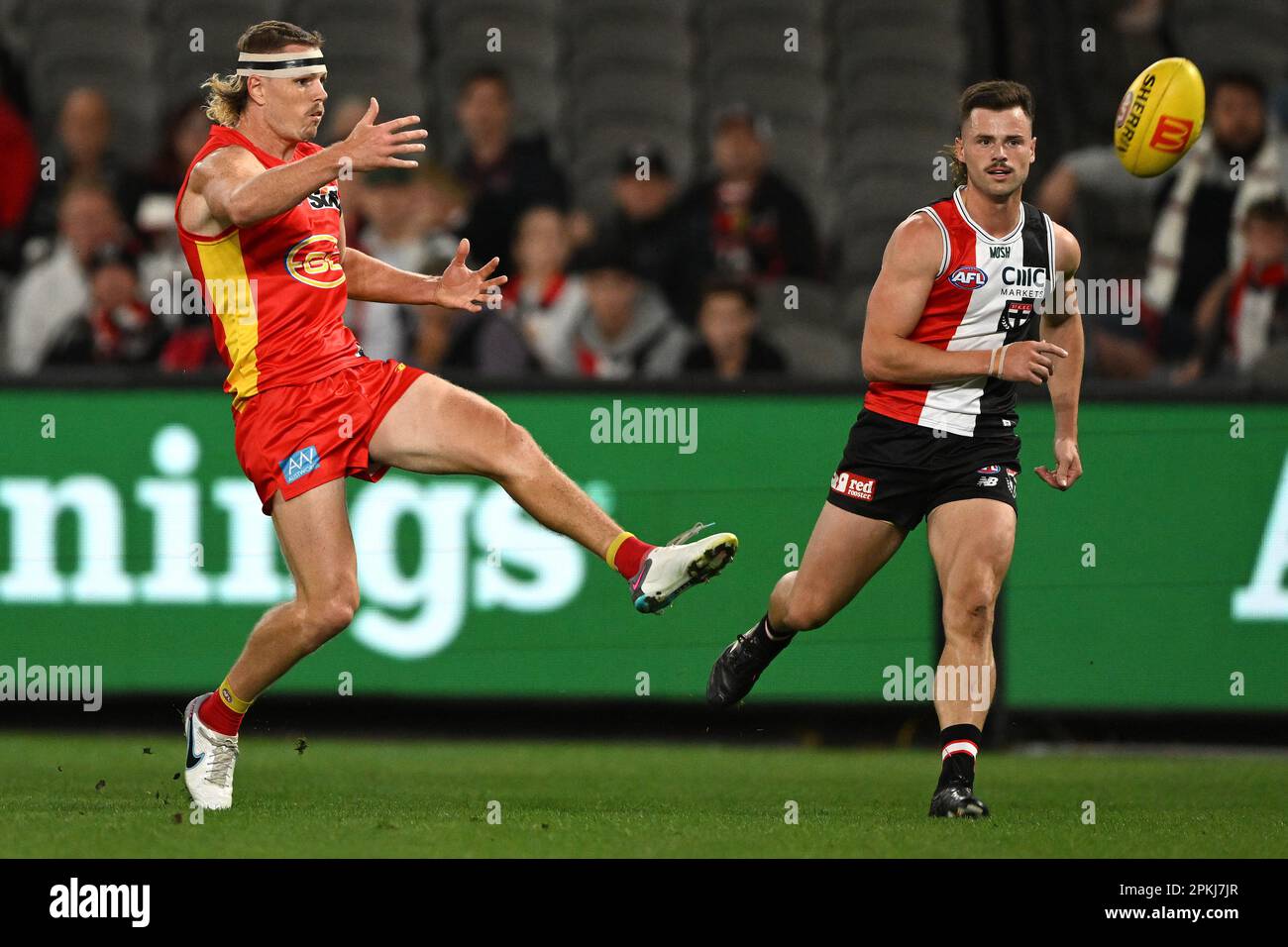 Nick Holman of the Suns kicks the ball during the AFL Round 4 match ...