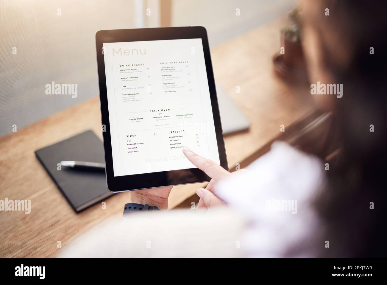 Above person, menu and tablet in cafe for ordering food, meal and lunch ...